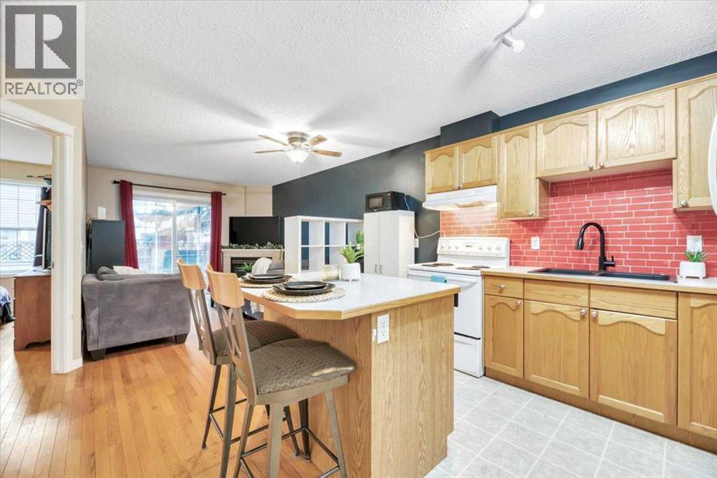 À vendre : 411, 103 STRATHAVEN Drive, Strathmore, Alberta T1P1W4 ...