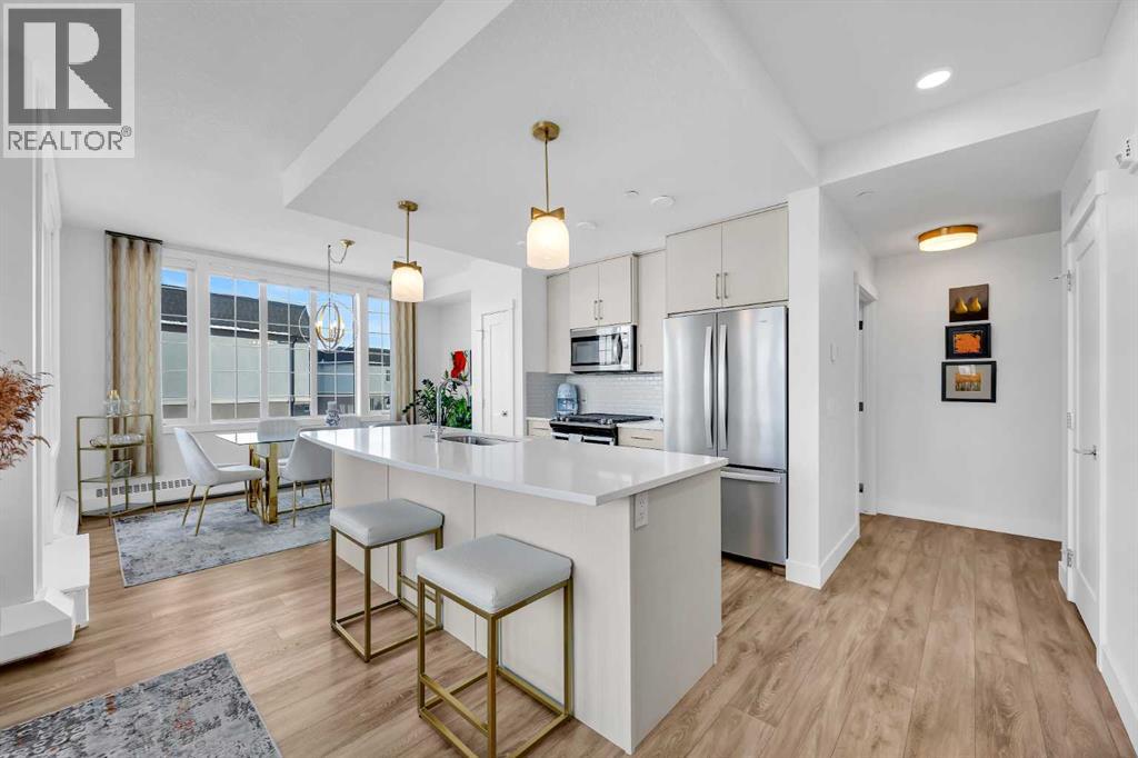 210, 38 Quarry Gate SE, Calgary, Alberta T2C5T6 - A2276029 | REALTOR.ca